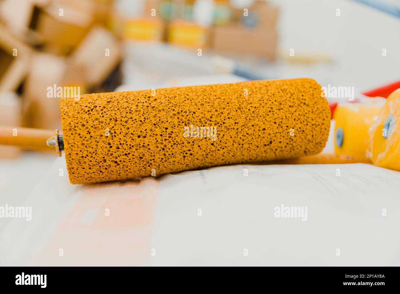 Tools used in epoxy floor painting Stock Photo - Alamy