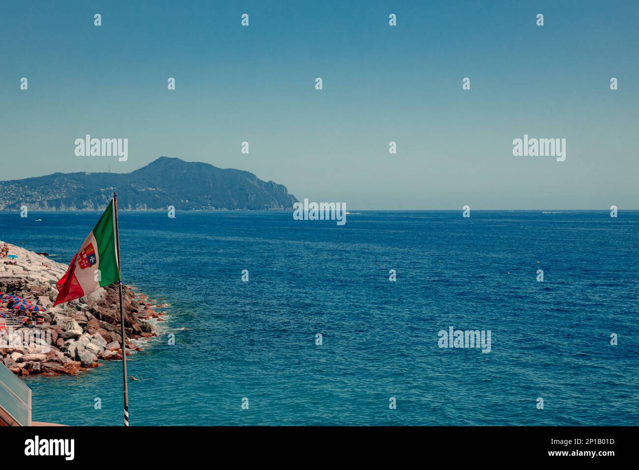 Italian flag on the beach of the Mediterranean Sea Stock Photo - Alamy