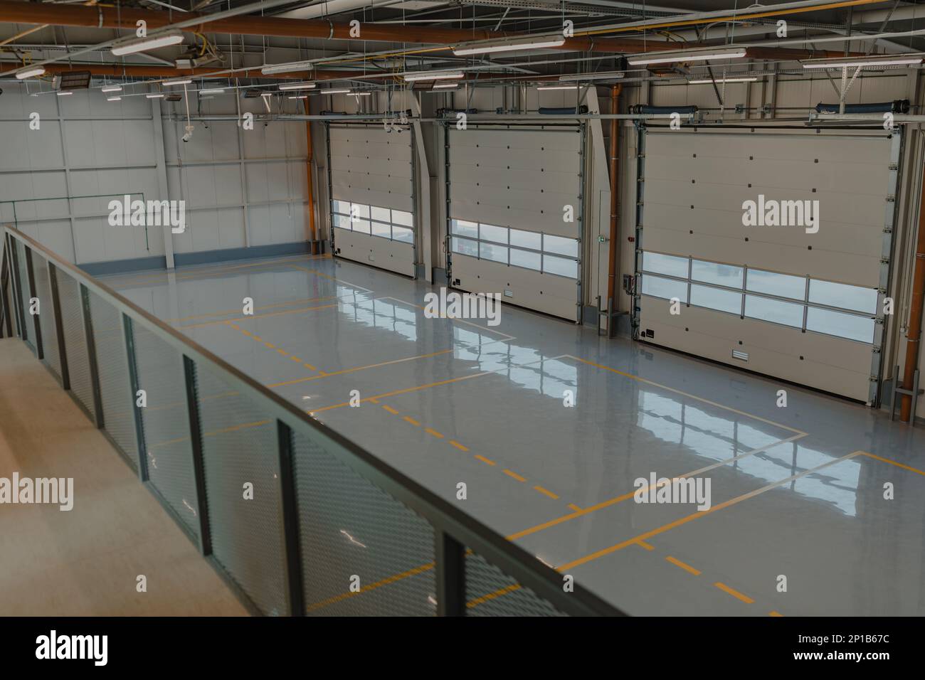 Garage doors in a car workshop Stock Photo - Alamy