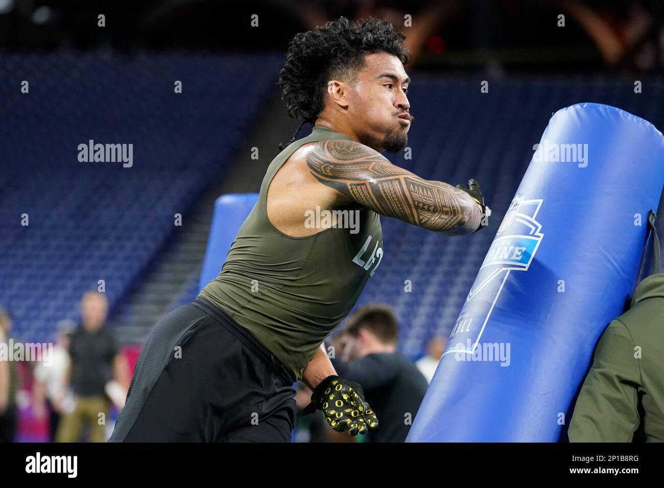 Oregon linebacker Noah Sewell runs a drill at the NFL football scouting ...