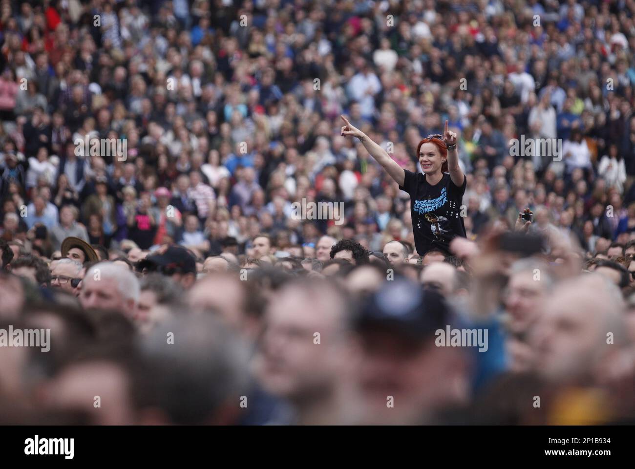 Fans watch the Bruce Springsteen concert at Croke Park stadium, Dublin ...