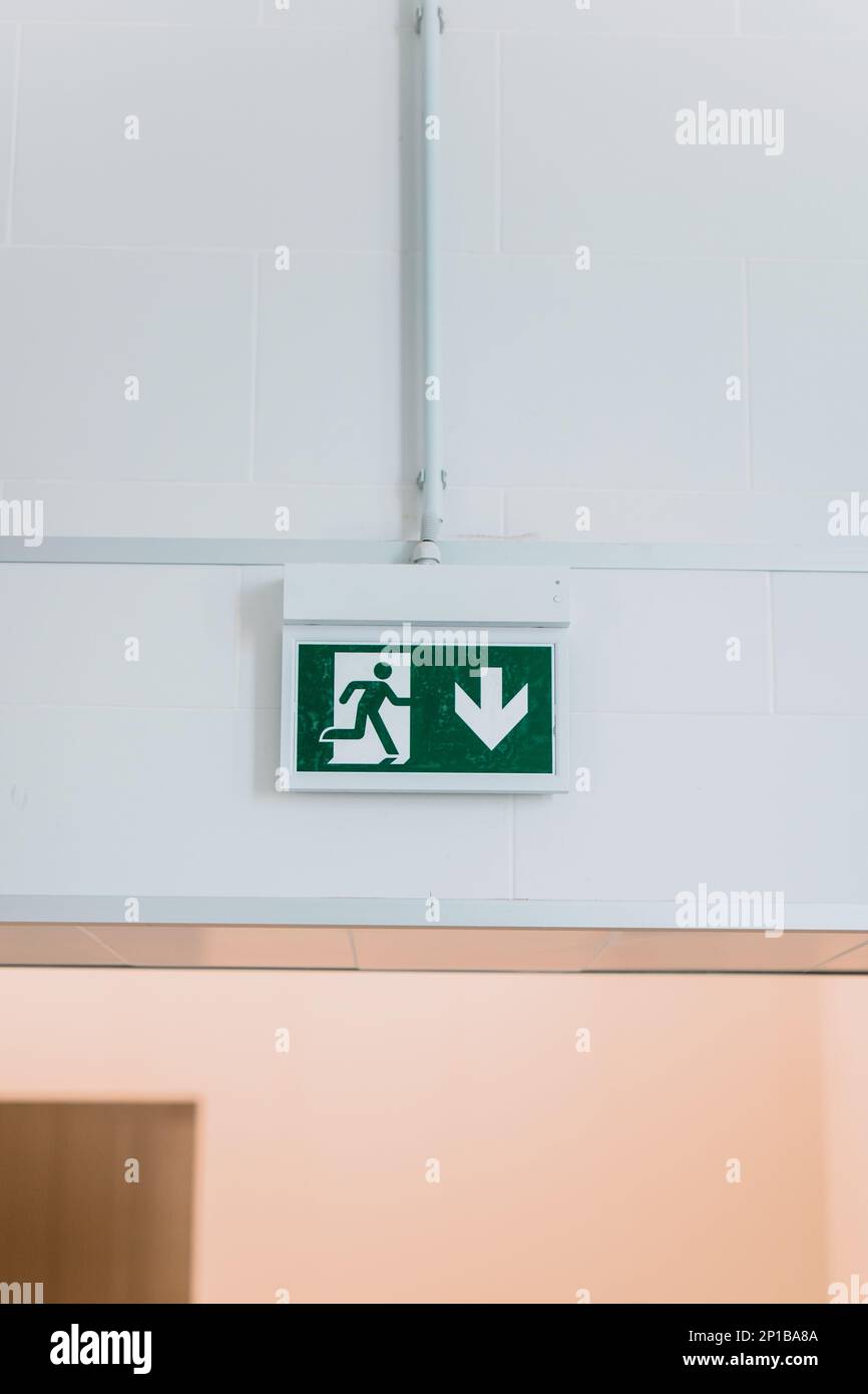 Emergency door escape light sign Stock Photo - Alamy