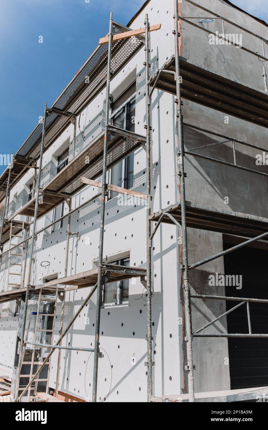 scaffolding on house facade,modern building under construction Stock ...