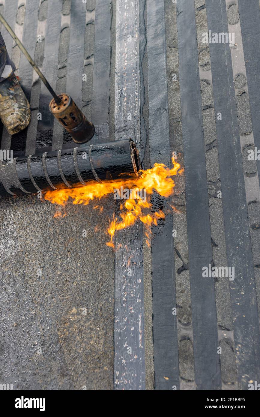 Bituminous membrane waterproofing system details and installation on flat rooftop Stock Photo ...