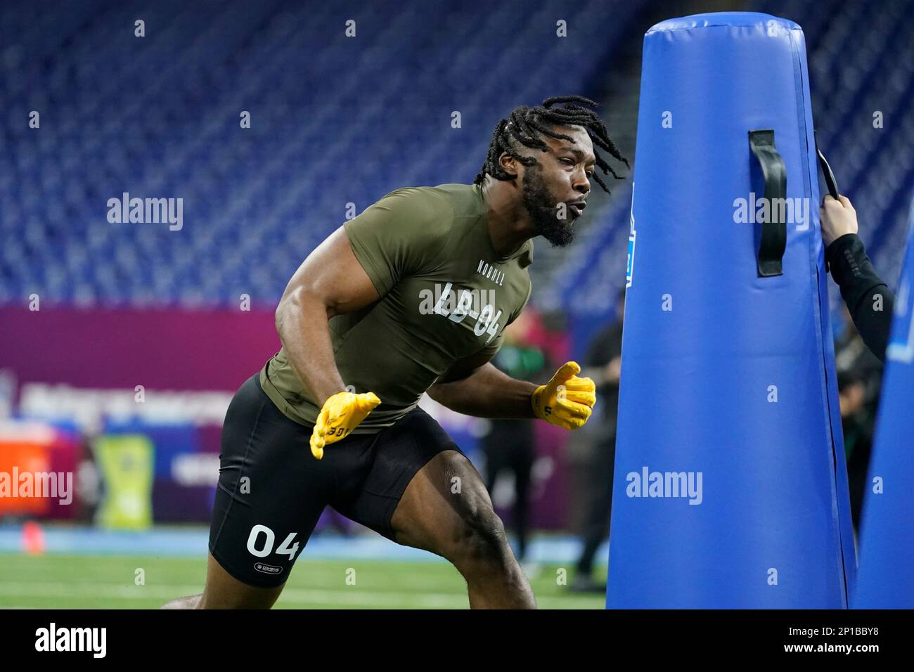 LSU linebacker Micah Baskerville runs a drill at the NFL football ...