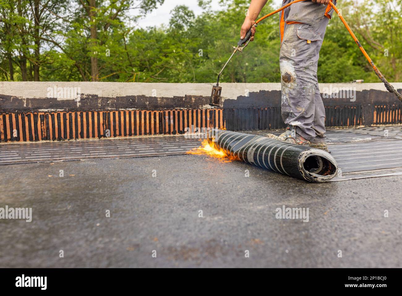 Bituminous membrane waterproofing system details and installation on flat rooftop Stock Photo ...
