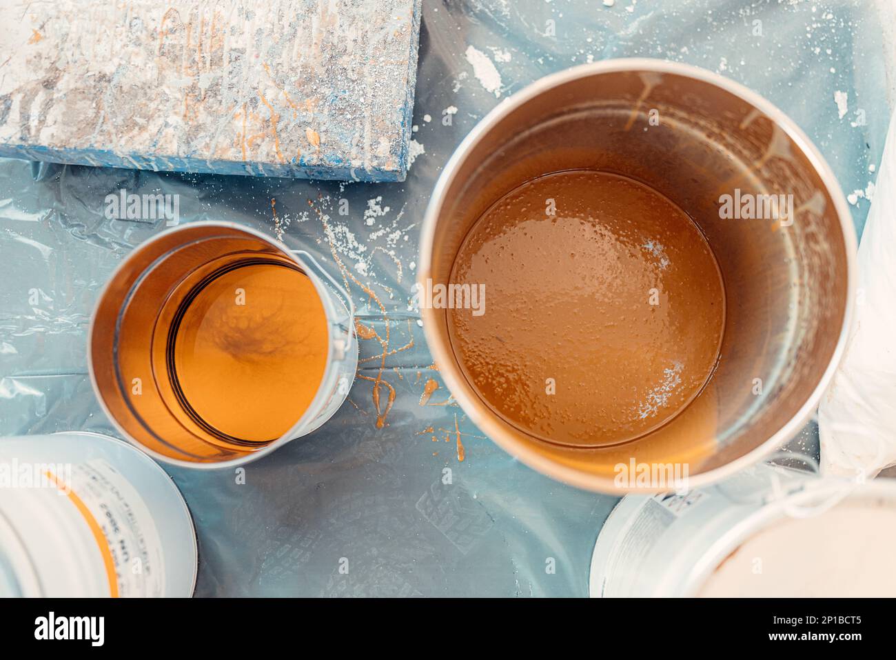 Mixture of yellow color with epoxy resin for industrial floors Stock ...