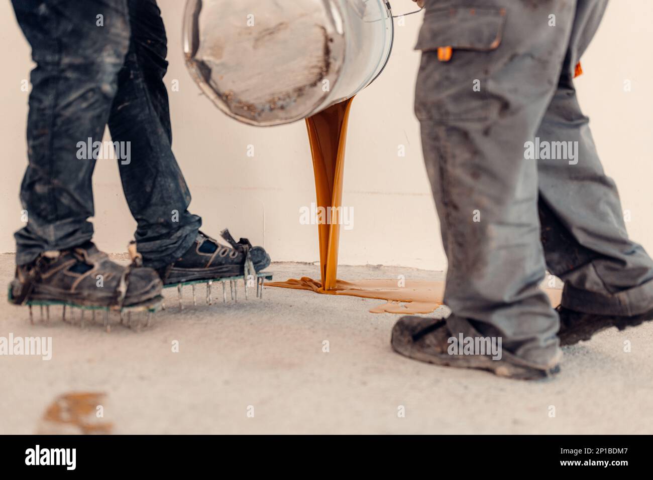 Epoxy resin poured on the freshly sanded concrete floor Stock Photo - Alamy