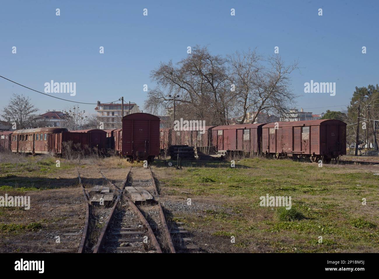 The sidings and yard with derelict items of rolling stock at now closed ...