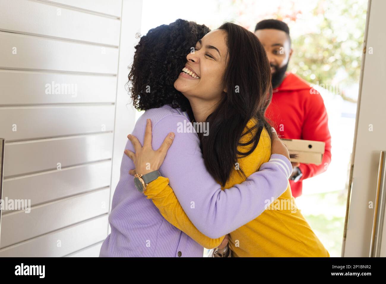 Greeting at the door hi-res stock photography and images - Alamy