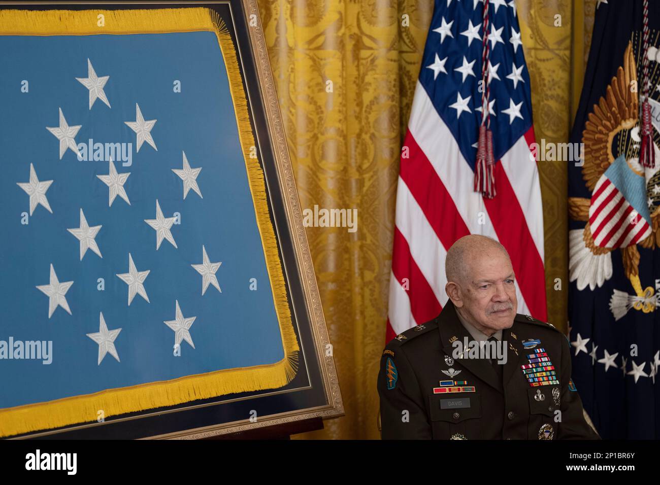 Ret. U.S. Army Colonel Paris Davis listens as United States President ...