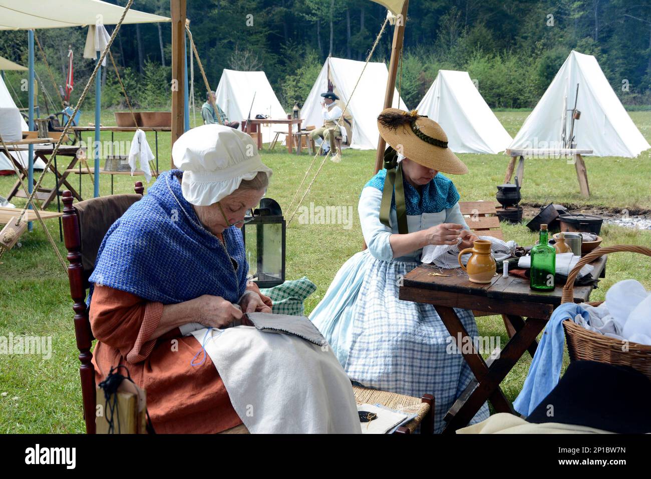 Jane Angelico of Bozrah, CT and Carrie Ward of Tolland, CT sew at a ...