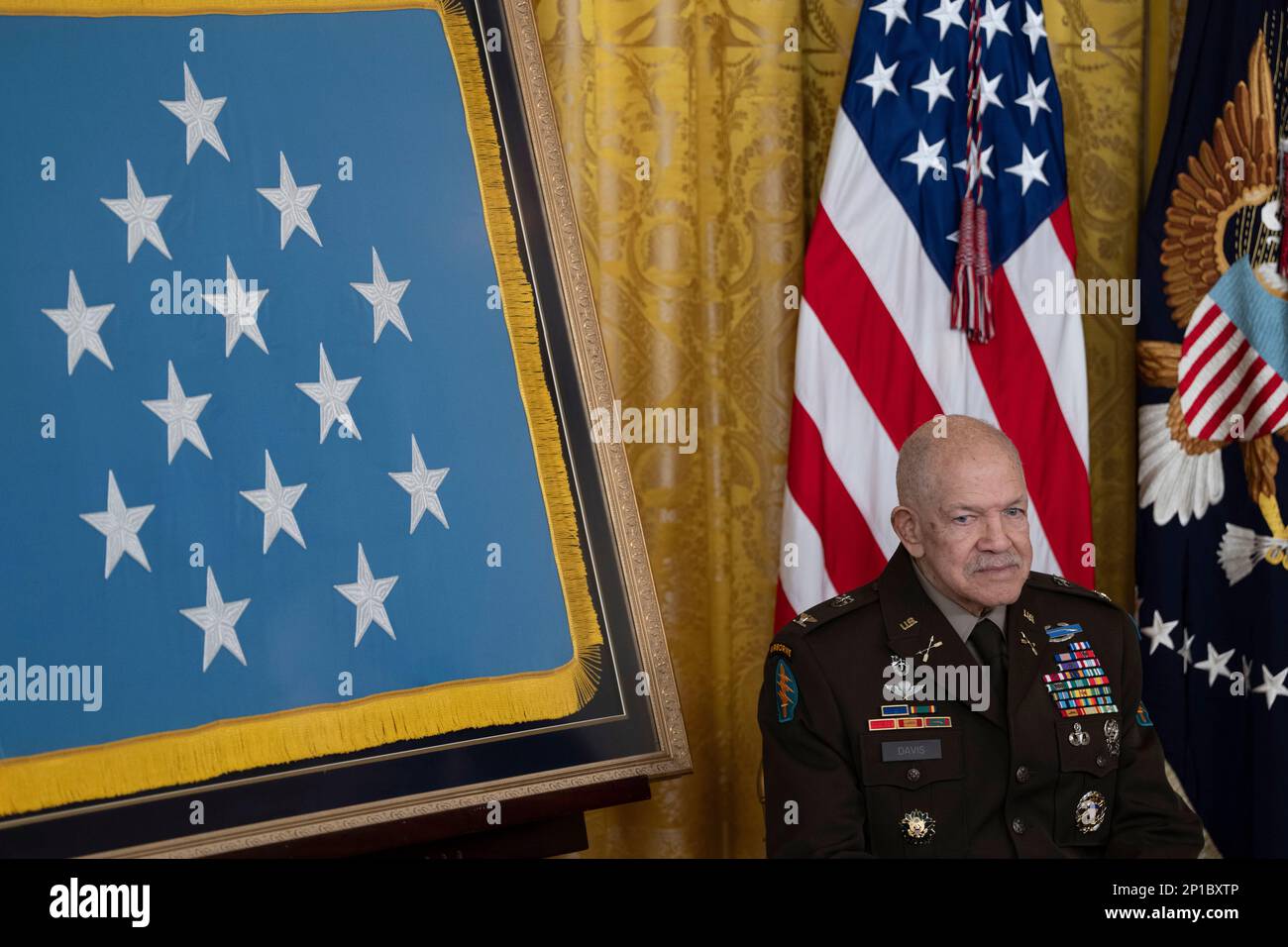 Ret. U.S. Army Colonel Paris Davis listens as United States President ...