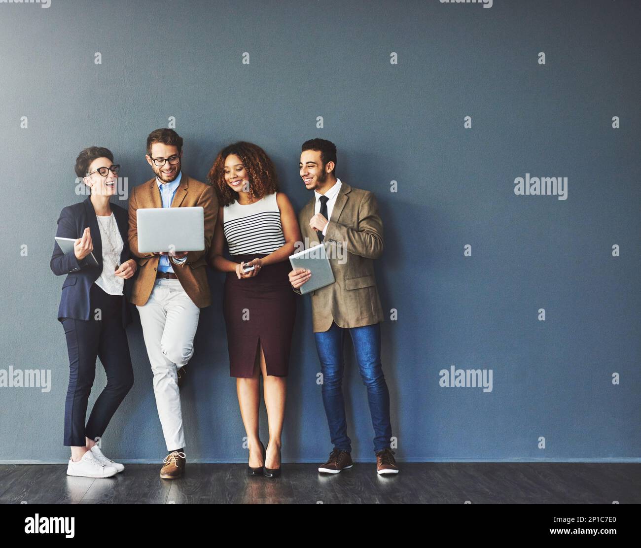 The connected team is an efficient team. Studio shot of a group of ...