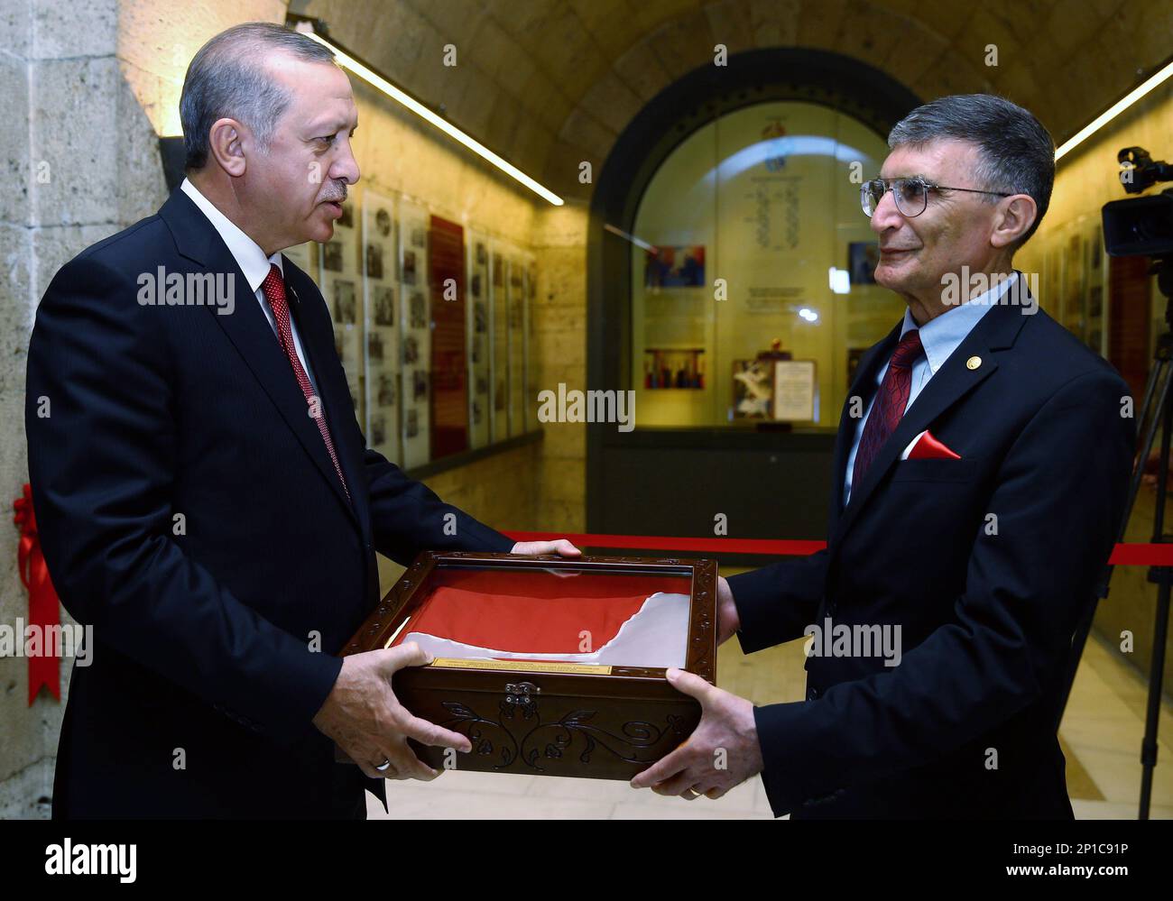 Nobel laureate in chemistry Professor Aziz Sancar, right, speaks with ...