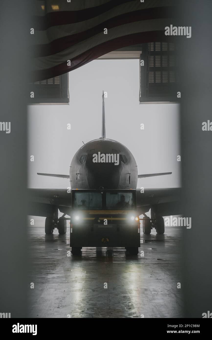 Crew chiefs assigned to the 6th Maintenance Group tow a KC-135 ...