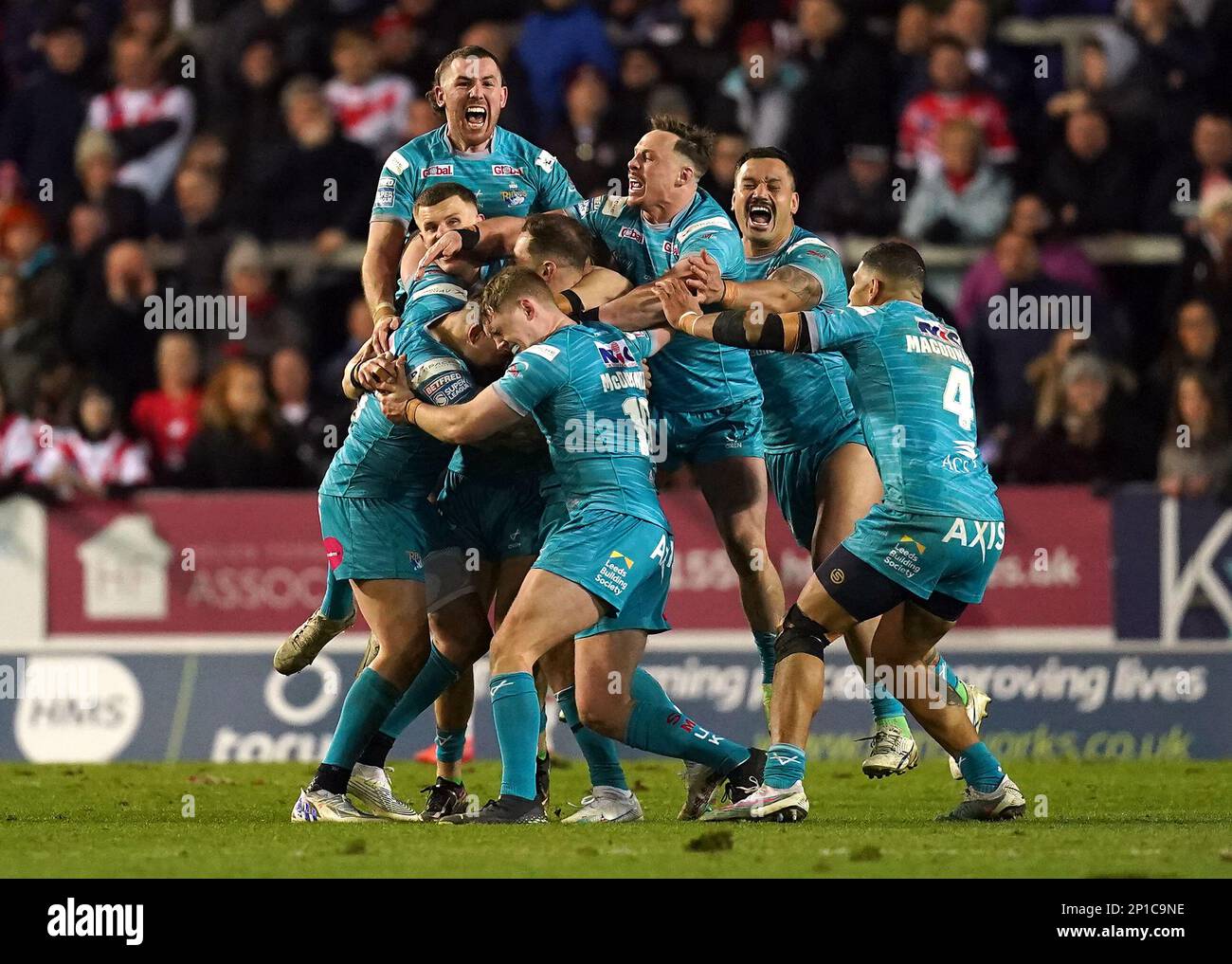 Leeds Rhinos' Blake Austin (hidden) celebrates scoring a golden point ...