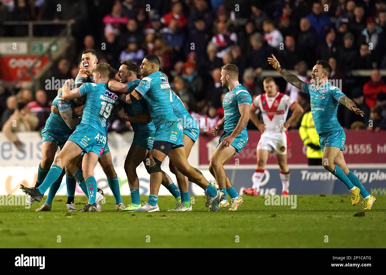 Leeds Rhinos' Blake Austin (hidden) celebrates scoring a golden point ...