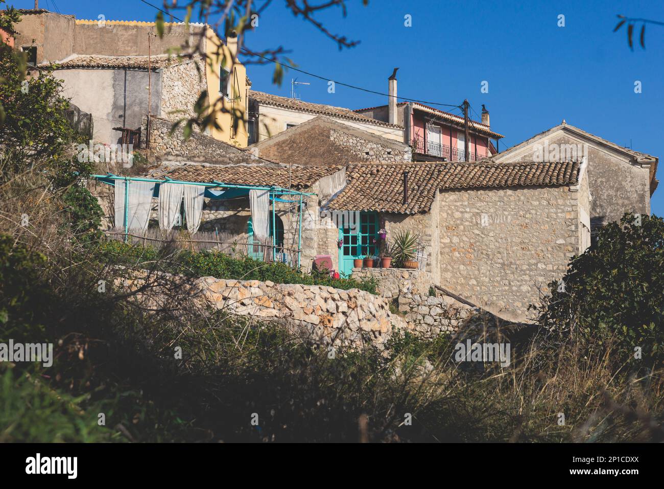 Beautiful view of Lakones streets and houses, traditional greek village ...