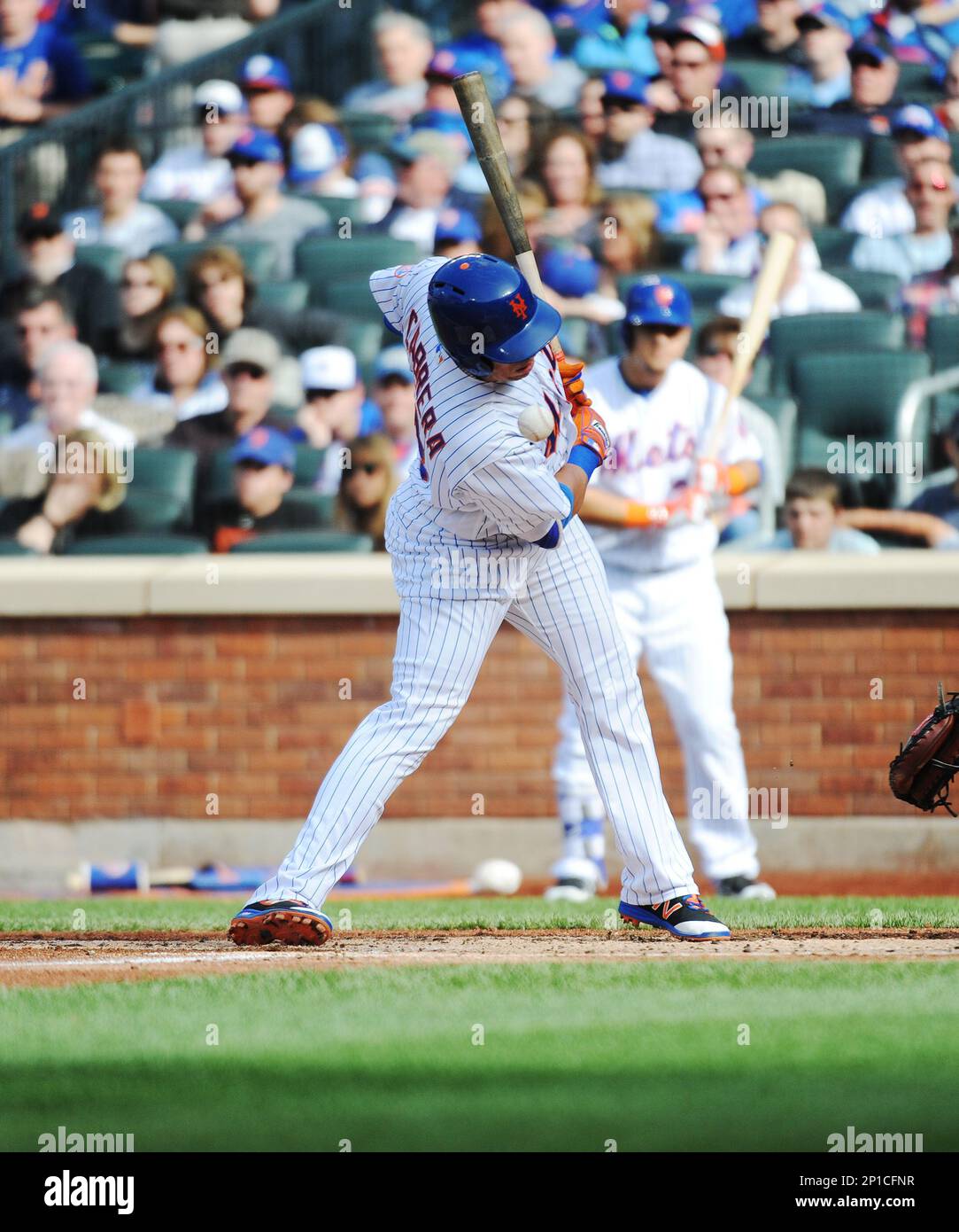 New York Mets infielder Asdrubal Cabrera (13) is hit by a Matt Cain ...