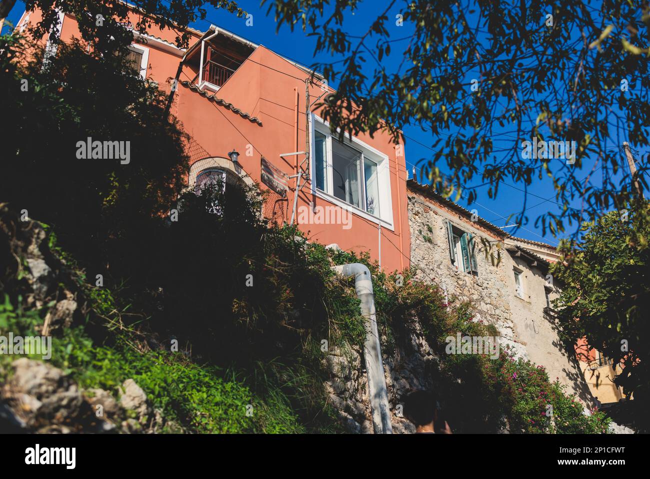 Beautiful view of Lakones streets and houses, traditional greek village ...