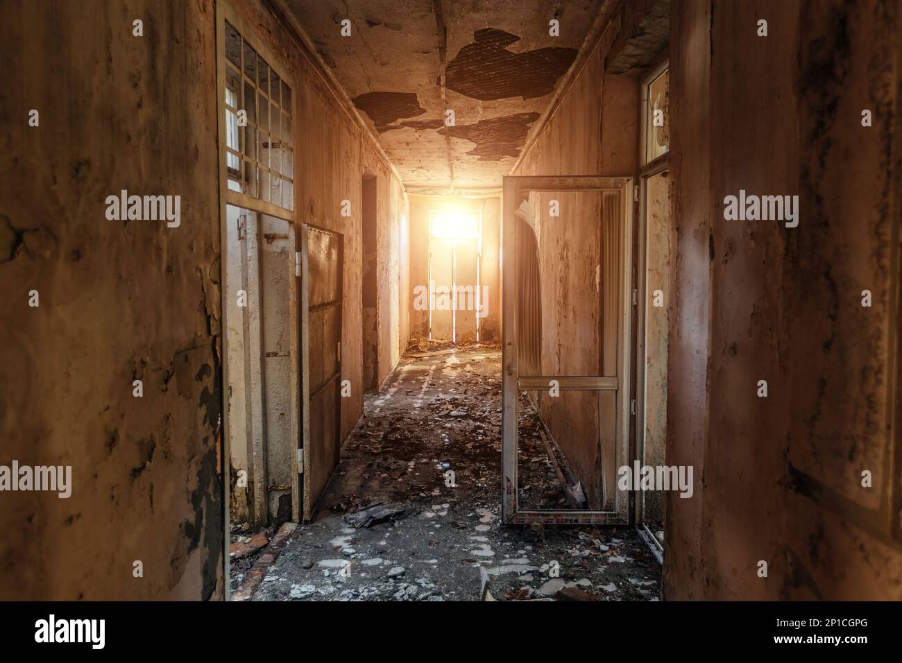 Dark dirty corridor of old rotten abandoned building Stock Photo - Alamy