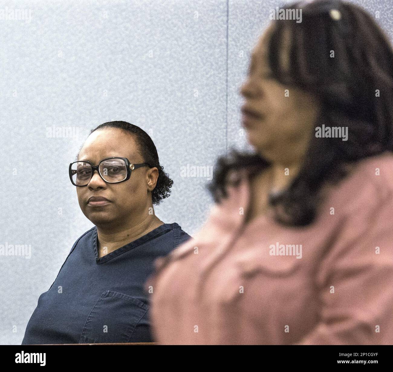 Brenda Stokes, left, looks at Tejuana Reeves, mother of murder victim ...