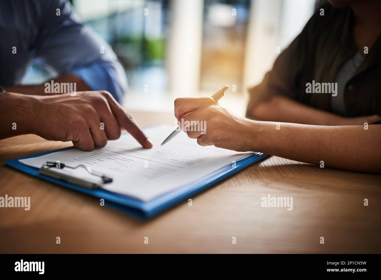 Your details go here. Cropped shot of a man and woman completing ...