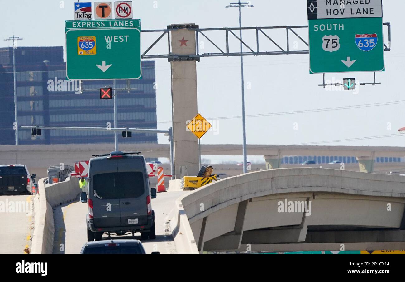 An express lanes highway sign marks an entrance in Dallas, Friday ...