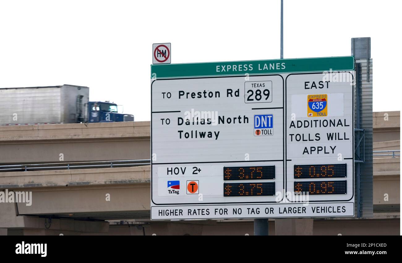 An express lanes highway sign marks an entrance in Dallas, Friday ...