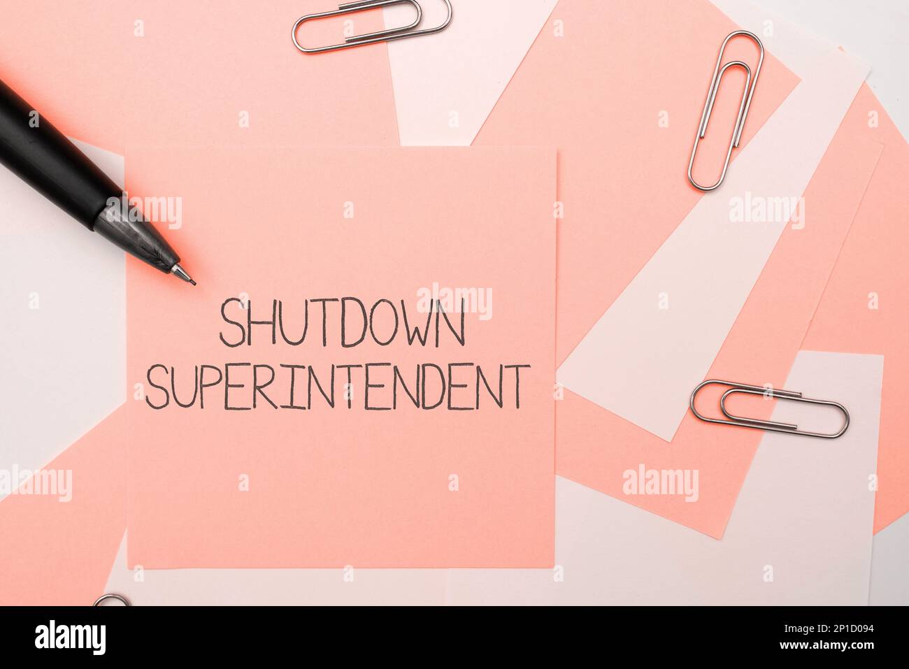 Hand writing sign Shutdown Superintendent. Word Written on person who ...