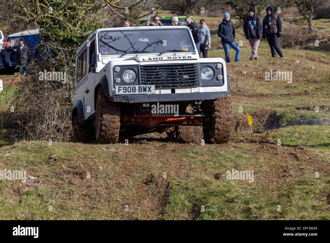 February 2023 - White Land Rover Defender 90 taking part in an ADWC off road trial at Chewton ...