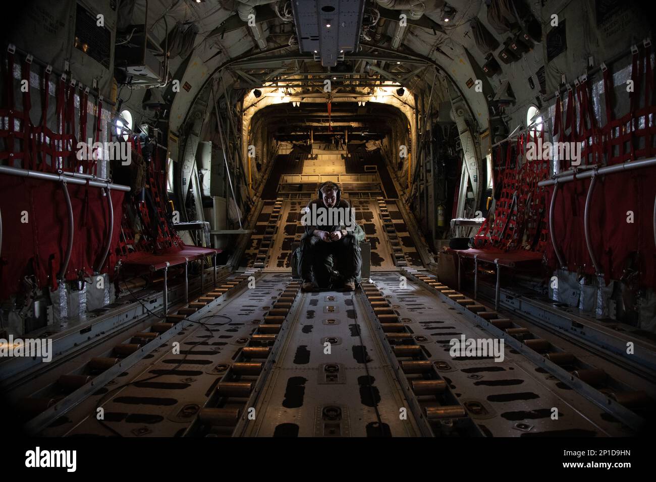 U.S.Marine Corps Cpl. Tyler Bearden, a fixed-wing aircraft load master ...