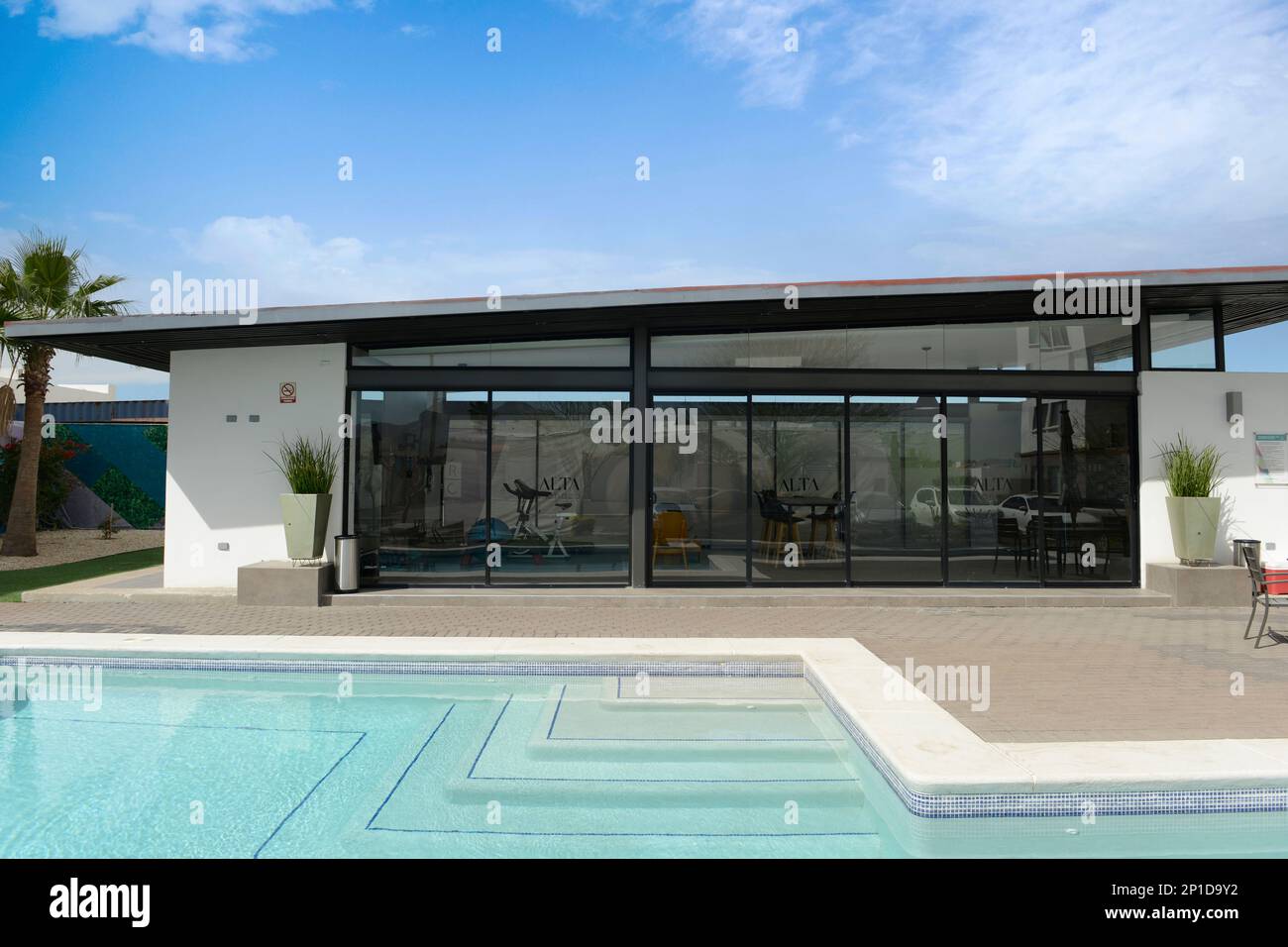 Alta Monaco Apartments fitness center and pool by LandPro in Hermosillo ...