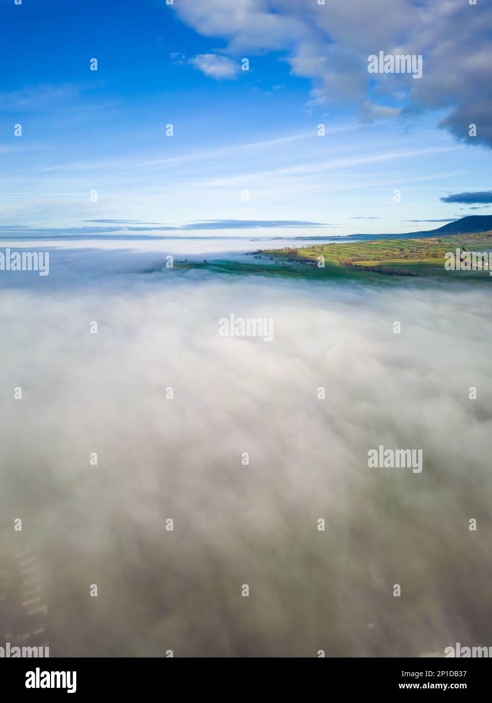 Aerial view of fog caused by a temperature inversion over a rural ...