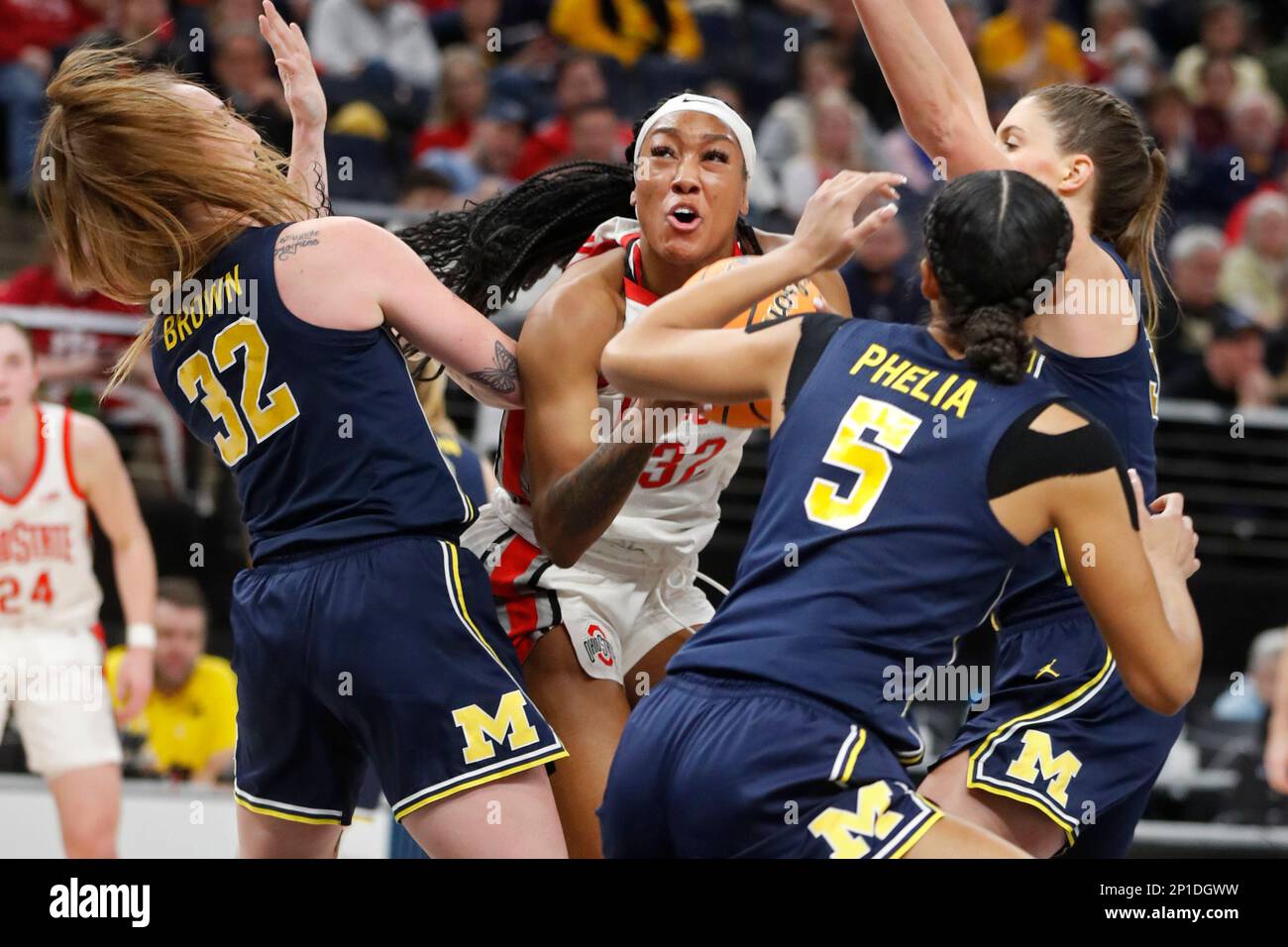 Ohio State forward Cotie McMahon, second from left, looks for space to ...