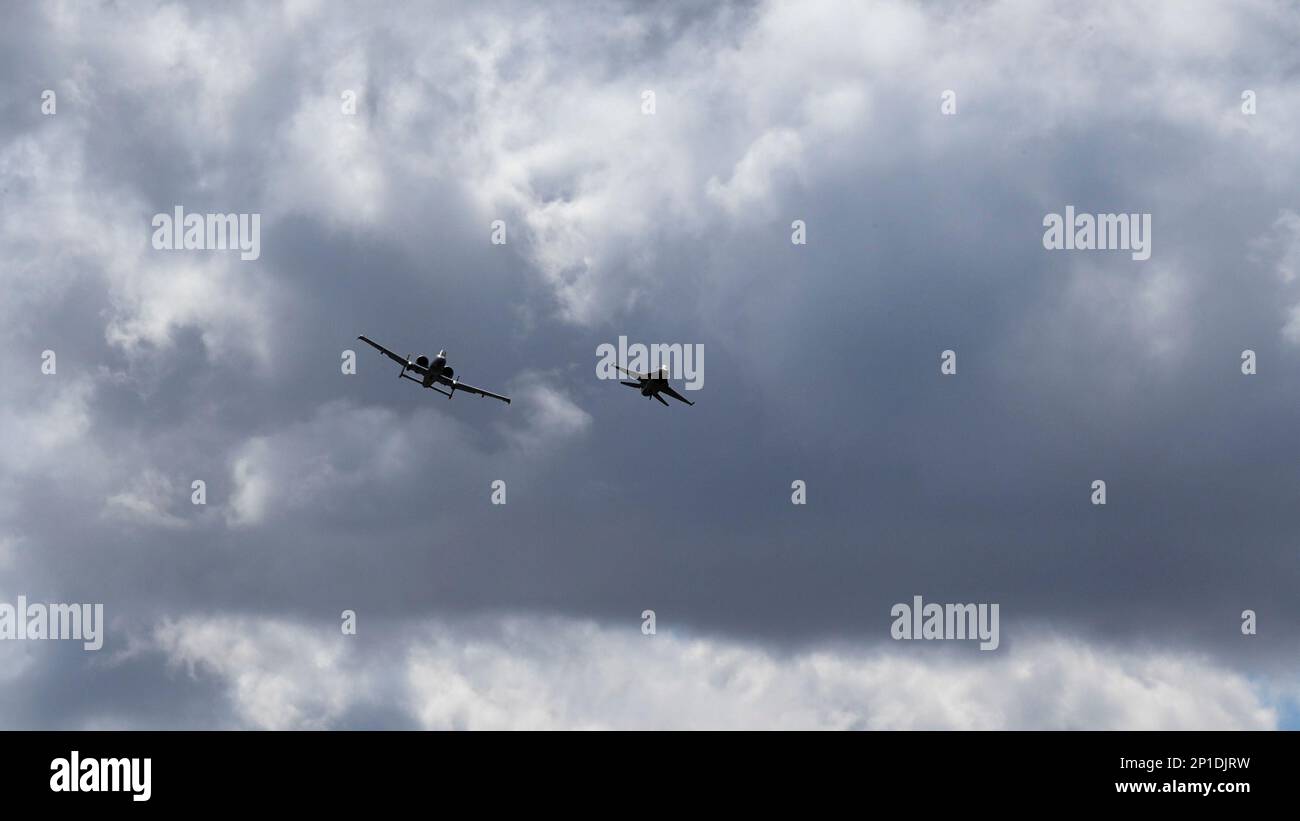 A U.S. Air Force A-10C Thunderbolt II flies alongside an F-16 Fighting ...