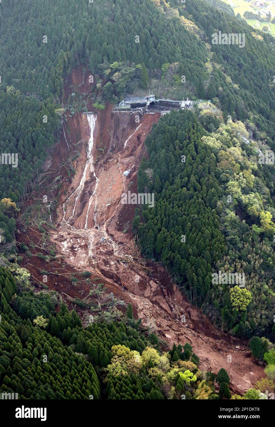 A photo shows scars of a landslide triggered by the massive earthquake ...