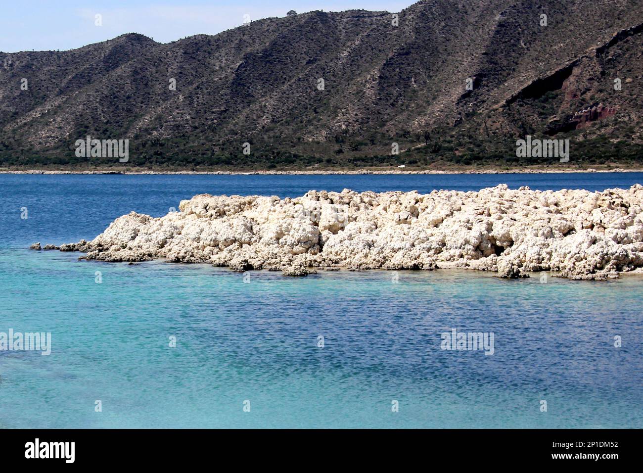 Landscape of white rock formations and body of water, lagoon of ...