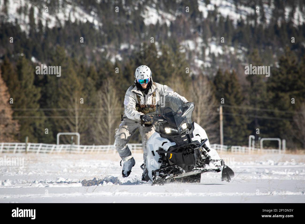 A 10th Special Forces Group (Airborne) Green Beret practices snowmobile ...