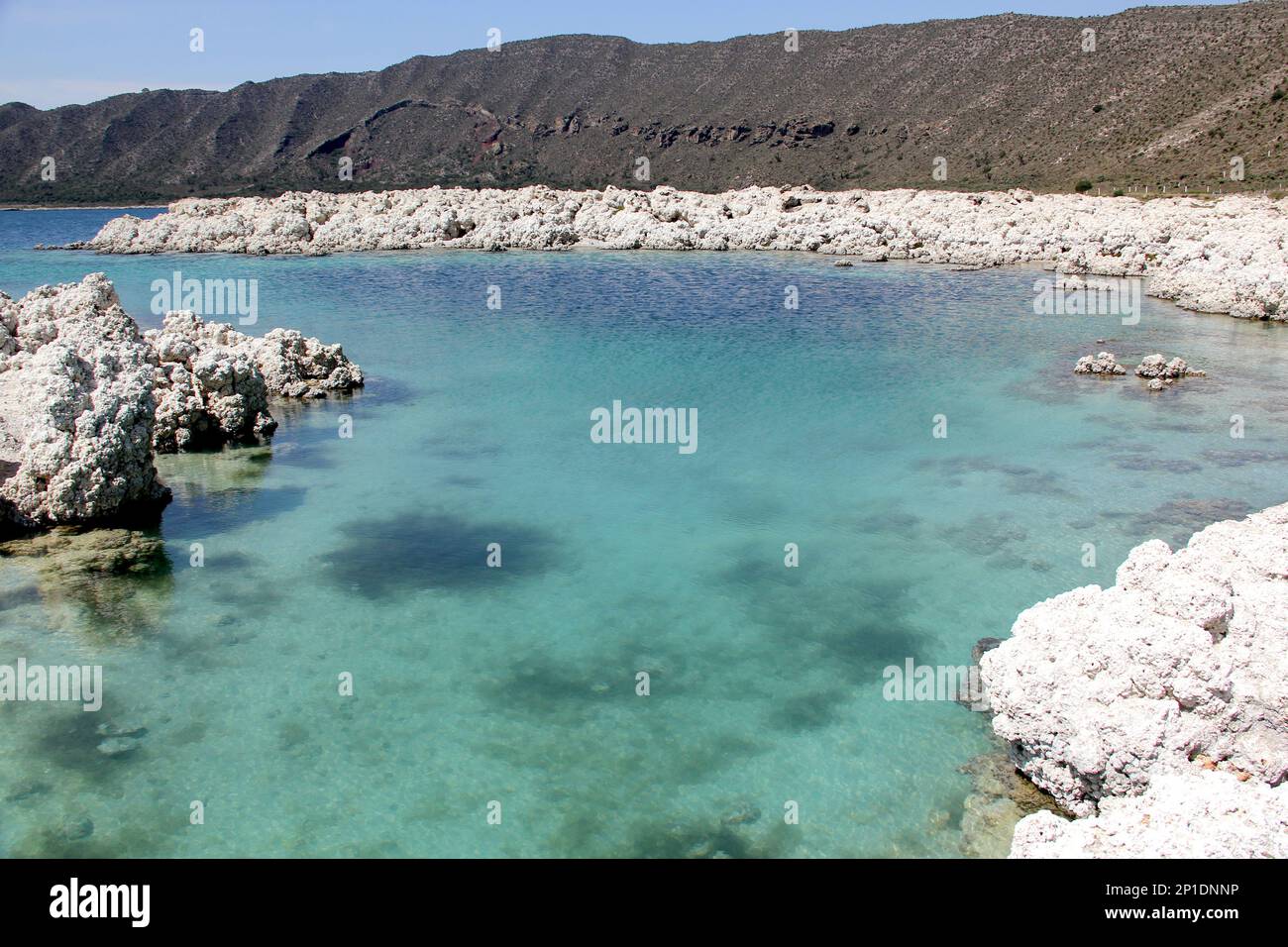 Landscape of white rock formations and body of water, lagoon of ...