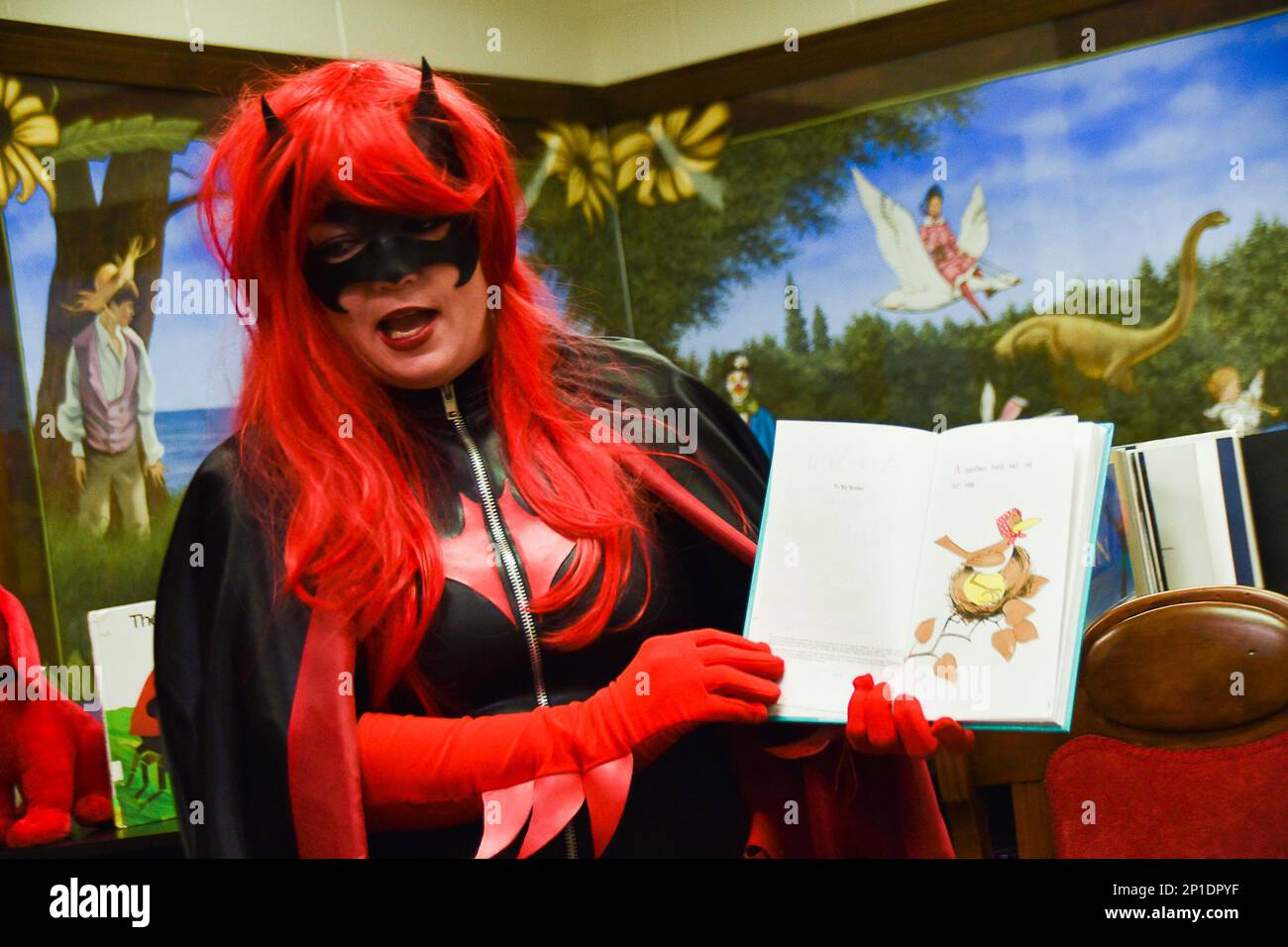 Batwoman, Sarah Leary, read a book to children at Newport Public ...