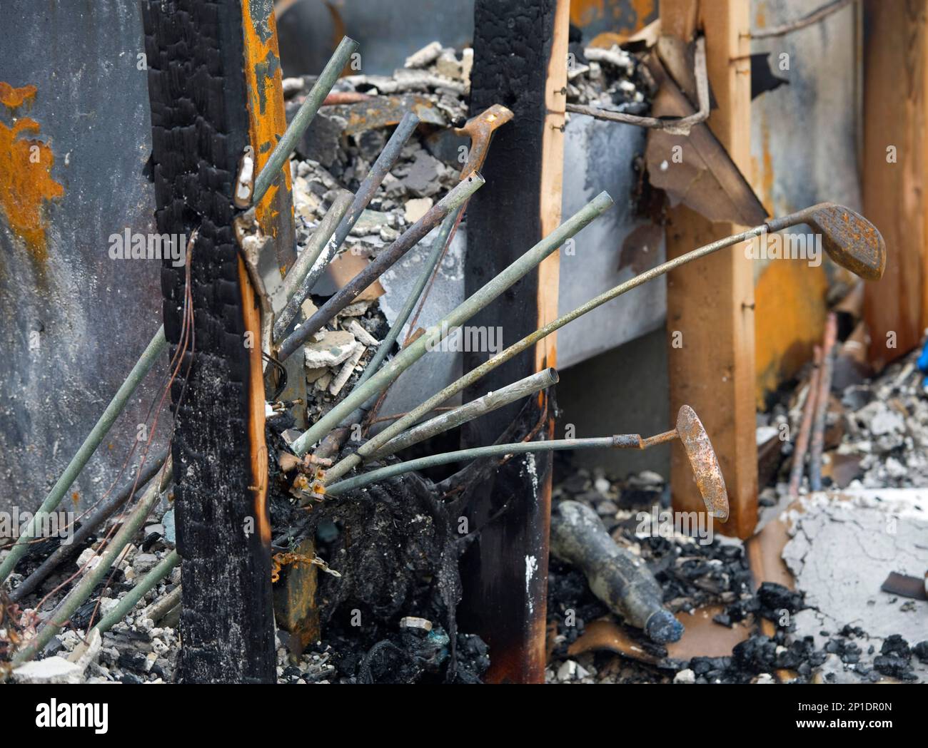 Golf clubs are among the remains at Bent Creek Golf Course Wednesday ...
