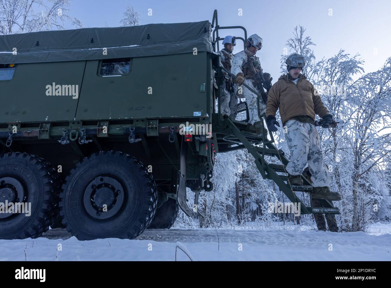 U.S. Marines with 2d Marine Division, dismount a Medium Tactical ...