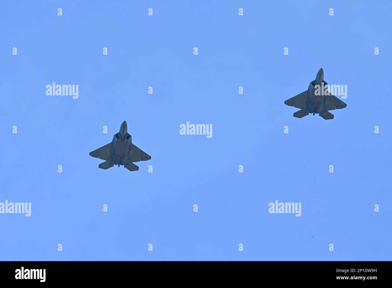 Two F-22 Raptors assigned to the 525th Expeditionary Fighter Squadron ...