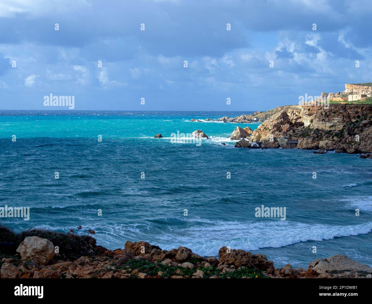 Golden Bay beach, Maltese islands. landscape. windy cloudy weather ...