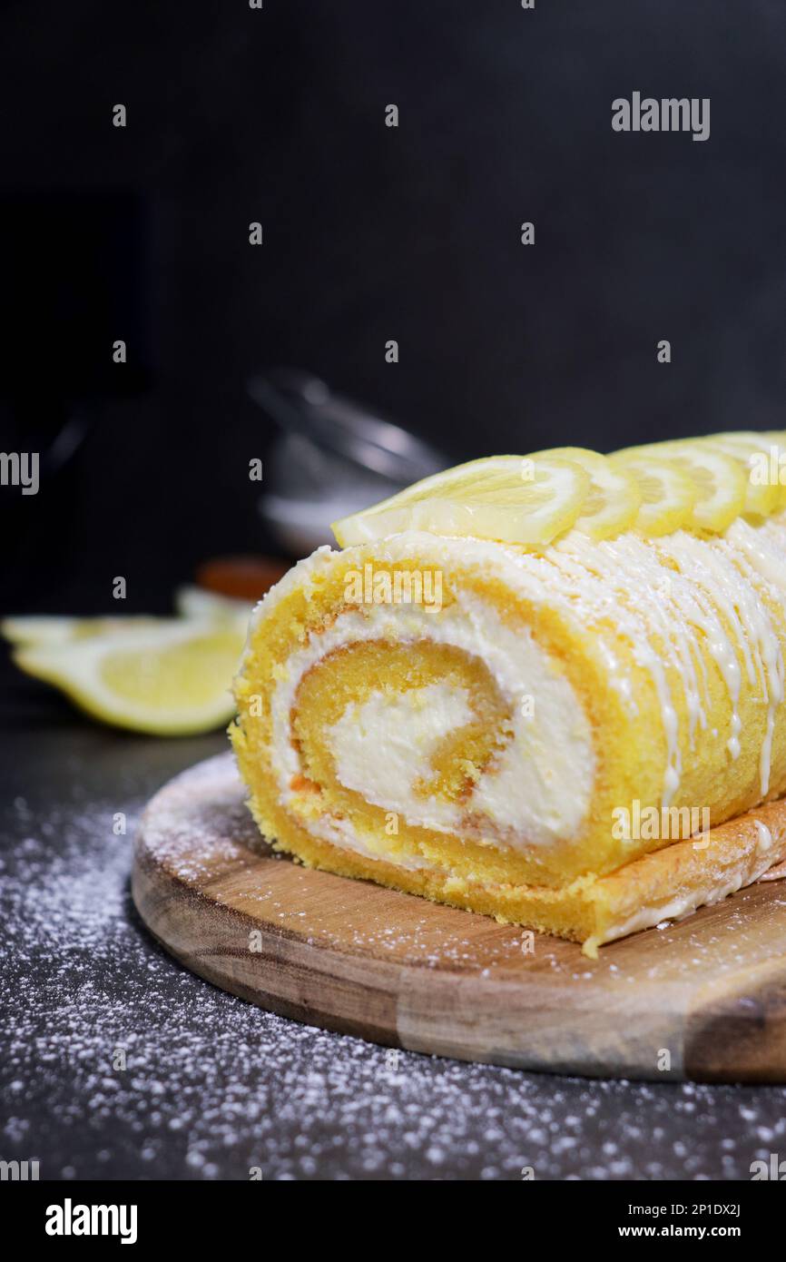 close up of vanilla cake roll with lemon butter cream inside Stock ...