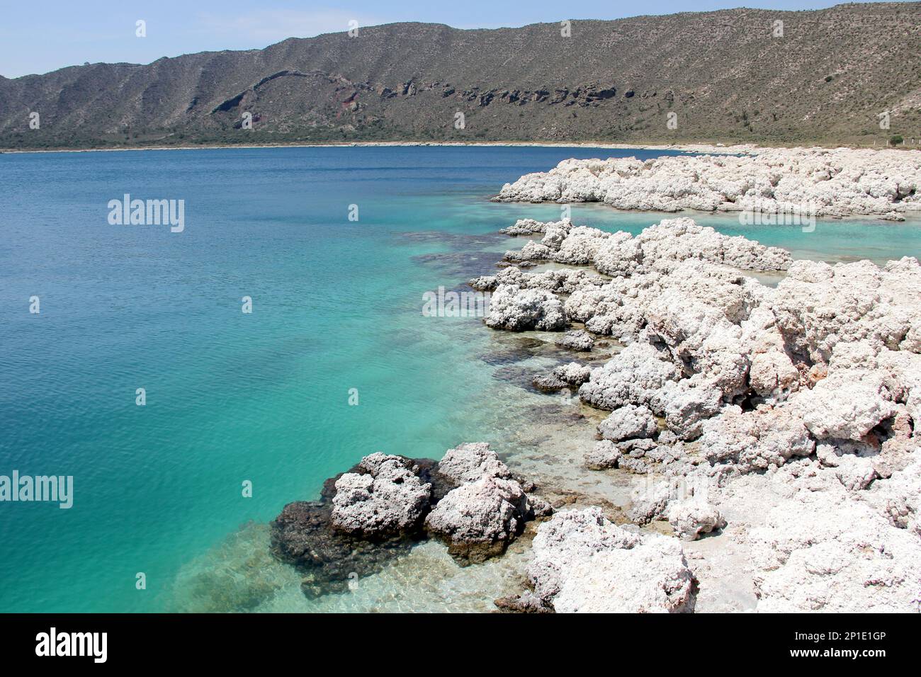 Landscape of white rock formations and body of water, lagoon of ...