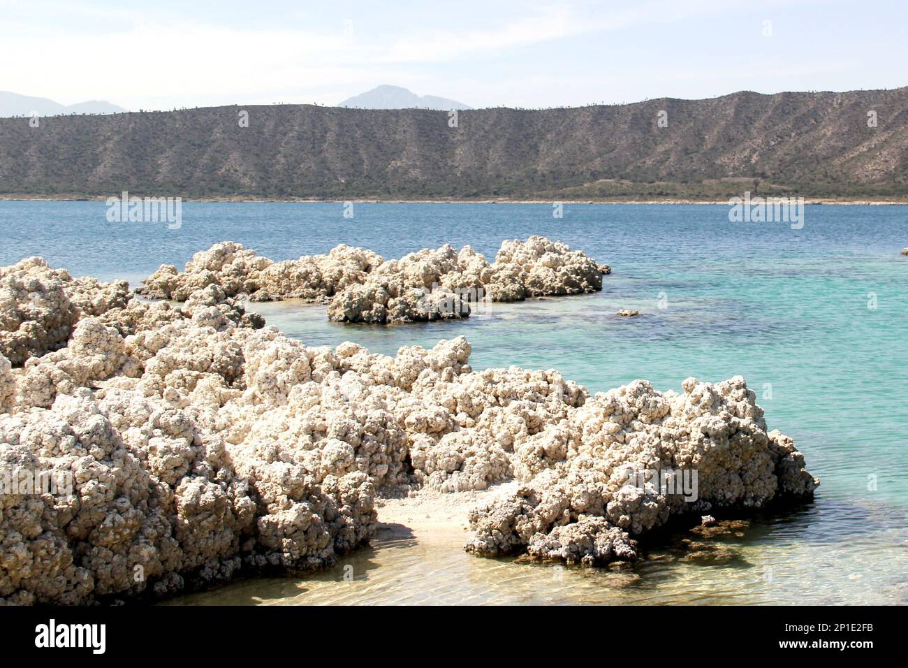 Landscape of white rock formations and body of water, lagoon of ...