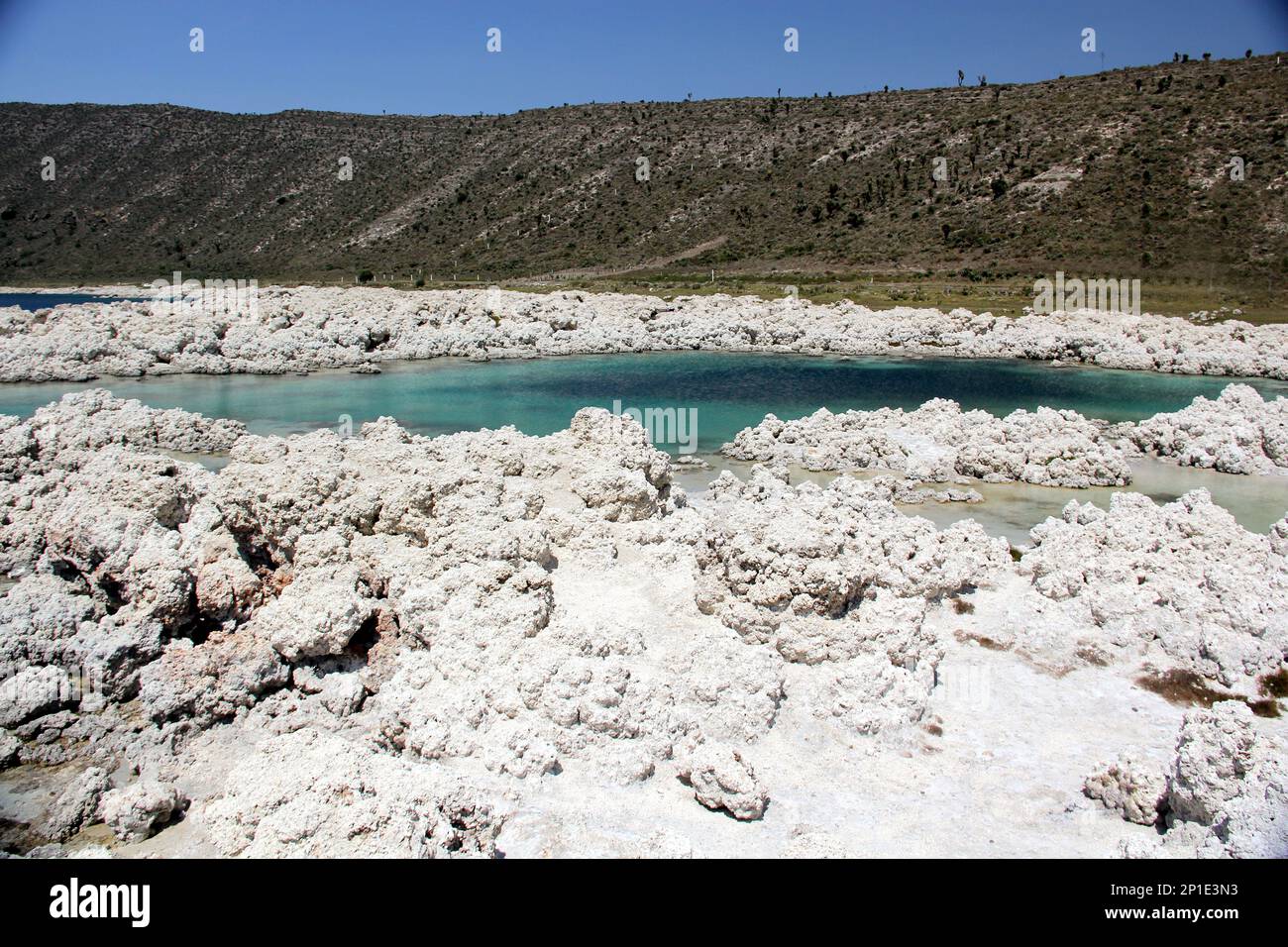 Landscape of white rock formations and body of water, lagoon of ...